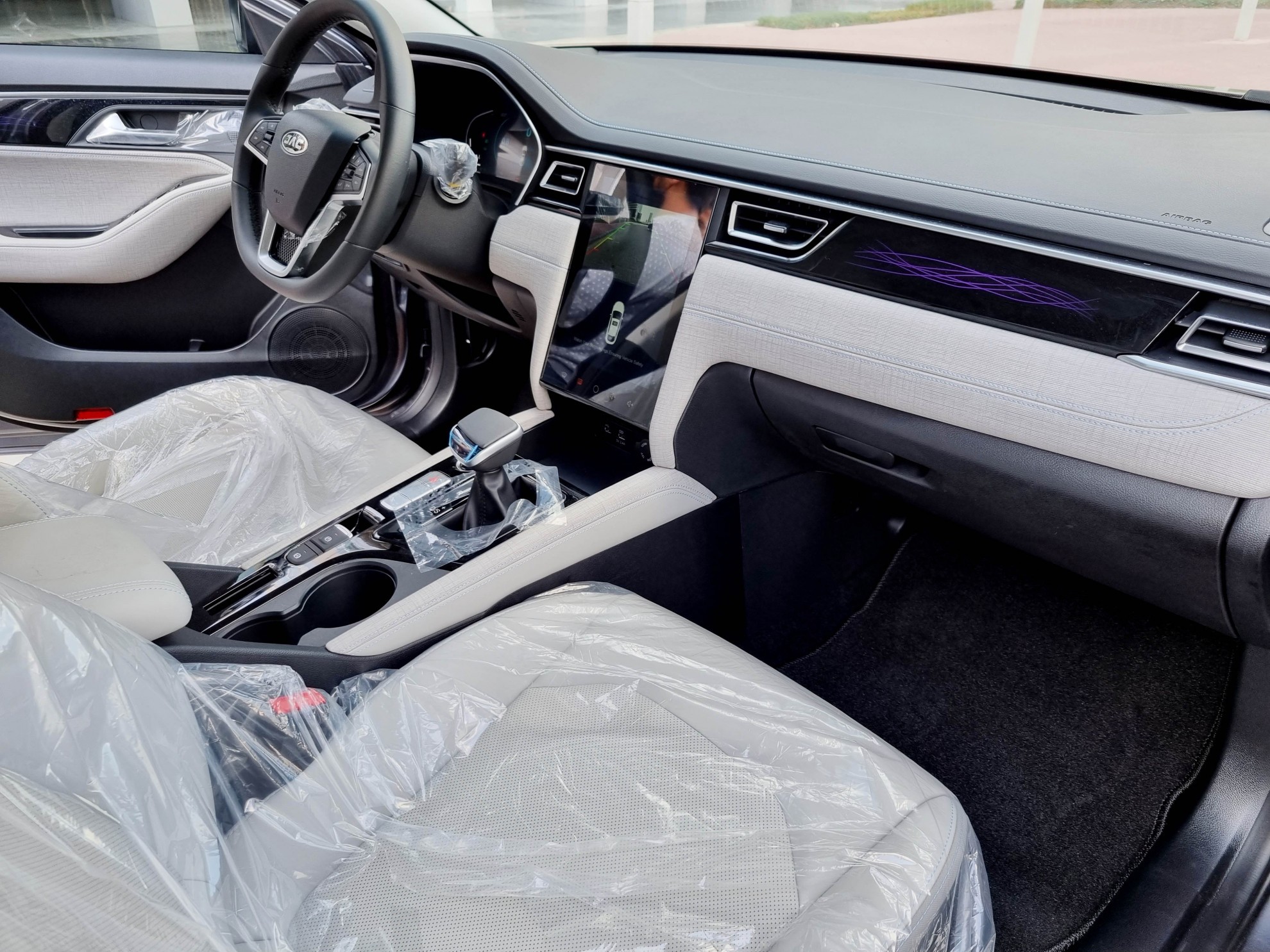 Explore the City in Style with JAC J7 - Quick Drive Car Rental